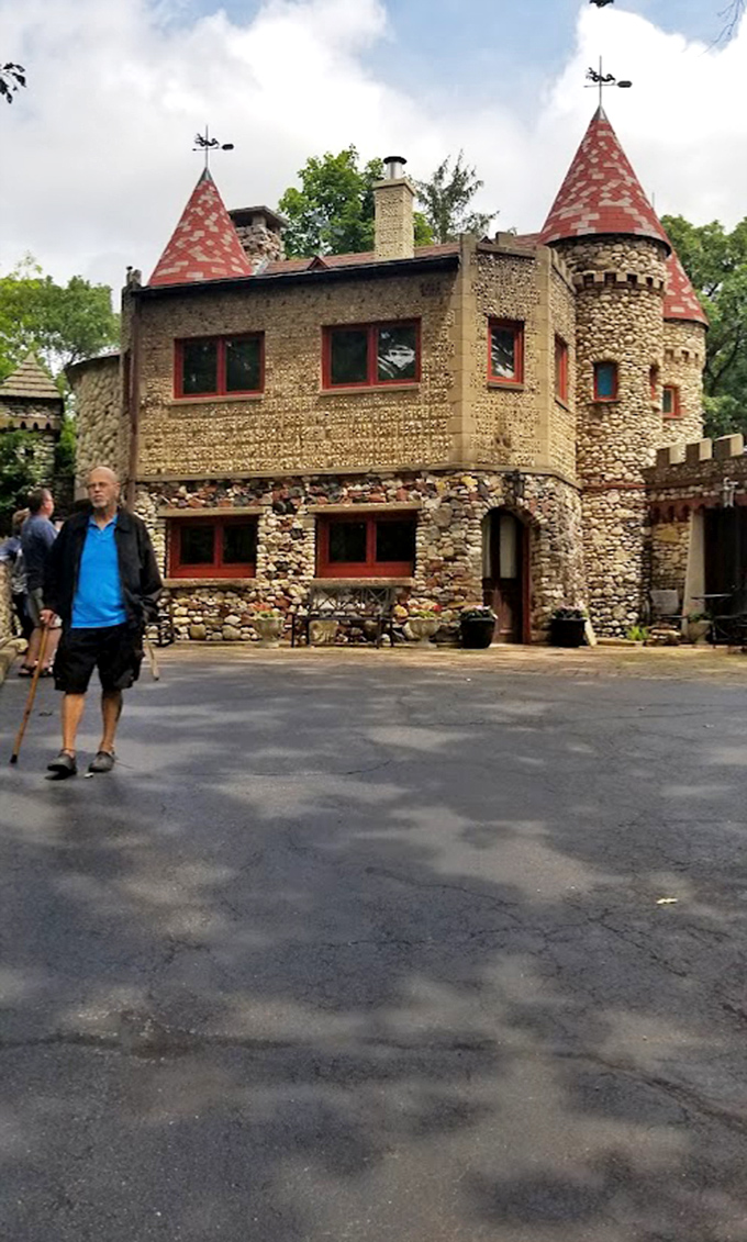 Viewed from a distance, the castle's distinctive profile rises unexpectedly from its suburban setting, a medieval dream realized in the modern Midwest.
