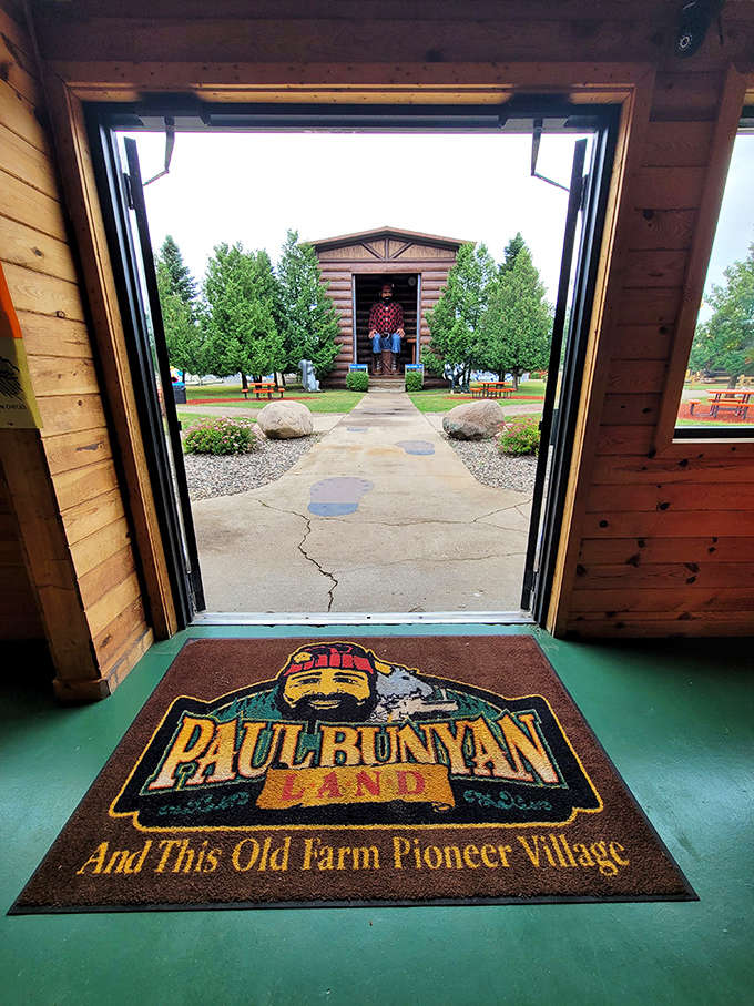 This doorway view frames the perfect shot of Paul's cabin, with footprints leading the way to Minnesota's most talkative lumberjack.