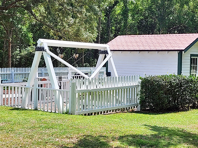 This charming porch swing invites visitors to sit a spell, contemplating maritime history while enjoying the same Gulf breezes that lighthouse keepers felt generations ago.