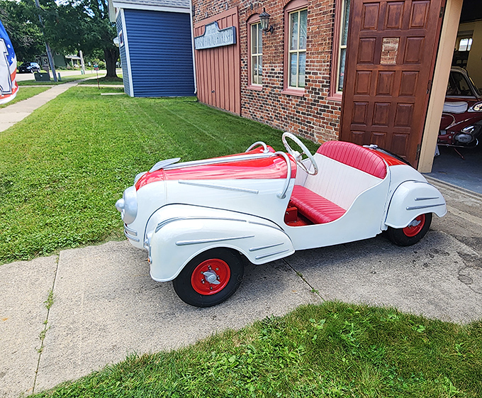 This pristine white and red mini-roadster looks ready for a Sunday drive &ndash; just don't expect to bring any luggage or adult-sized passengers.