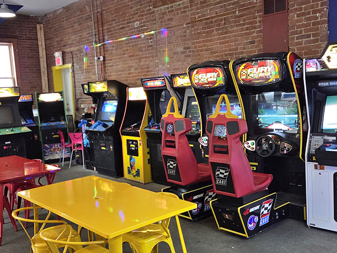 The arcade corner provides nostalgic entertainment, because nothing complements digesting great barbecue like a round of vintage racing games.