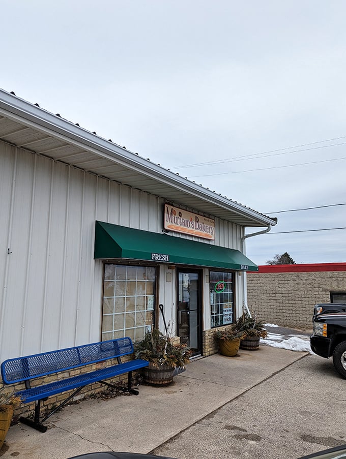 A cozy neighborhood bakery where a simple storefront hides warm smiles and irresistible homemade treats inside.