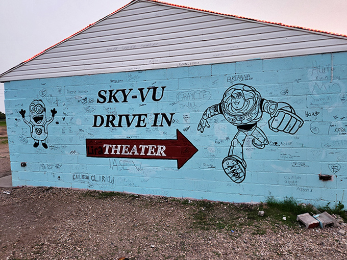 Buzz Lightyear points the way to infinity and beyond on the Sky-Vu's playfully painted wall, a landmark for generations of moviegoers.