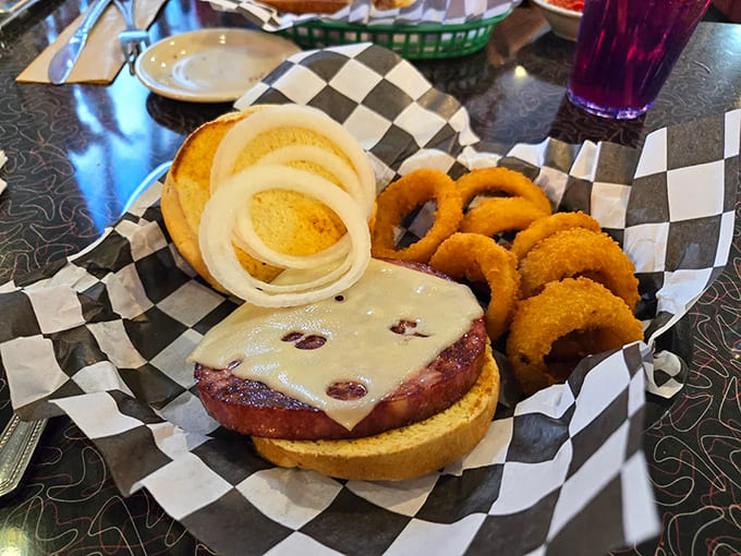 The bologna burger with onion rings &ndash; a childhood memory transformed into adult comfort food that makes you wonder why you ever stopped eating it.