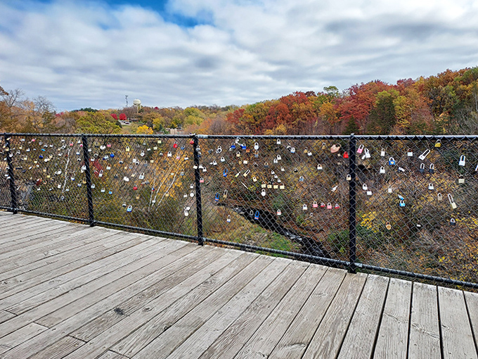 Love locks adorn this bridge like jewelry, each one representing a story that's as unique as the view stretching out below.