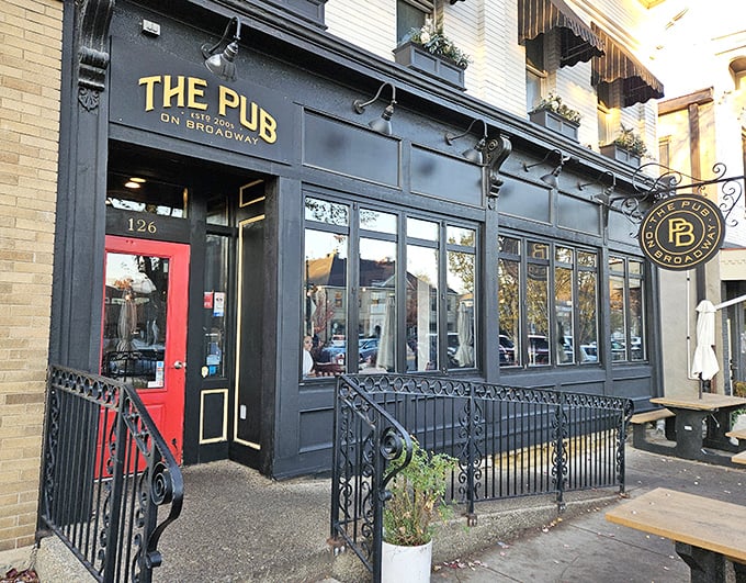 The Broadway Pub's classic facade and red door welcome hungry visitors to a local institution where comfort food reigns supreme and everybody knows somebody.