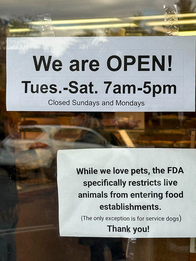 The hours sign confirms what your stomach already knows &ndash; this place is worth planning your schedule around.