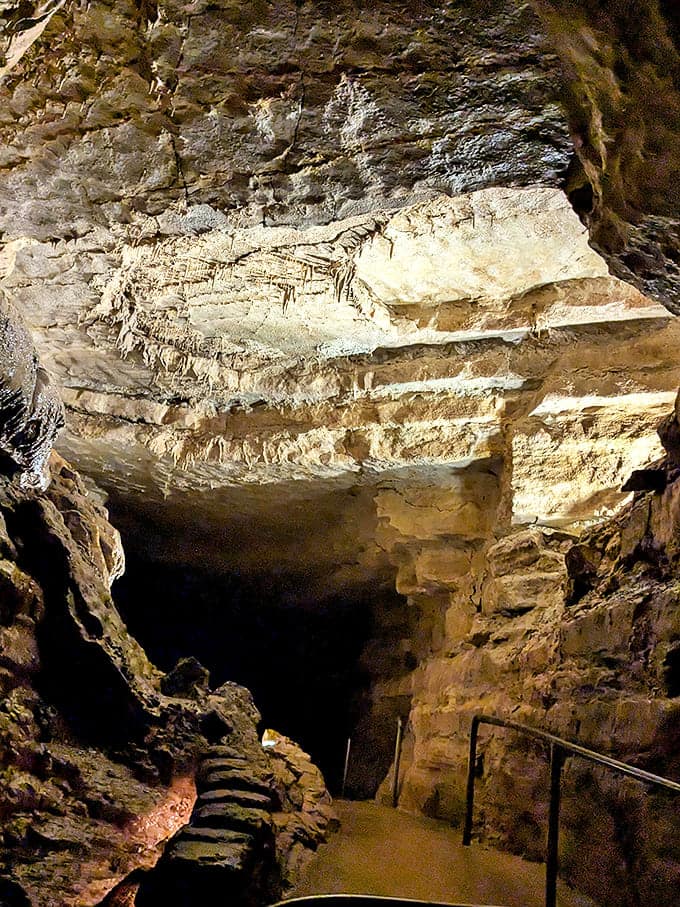 Descending into Mystery Cave reveals layer upon layer of limestone history, each stratum telling a different chapter of Earth's geological story.