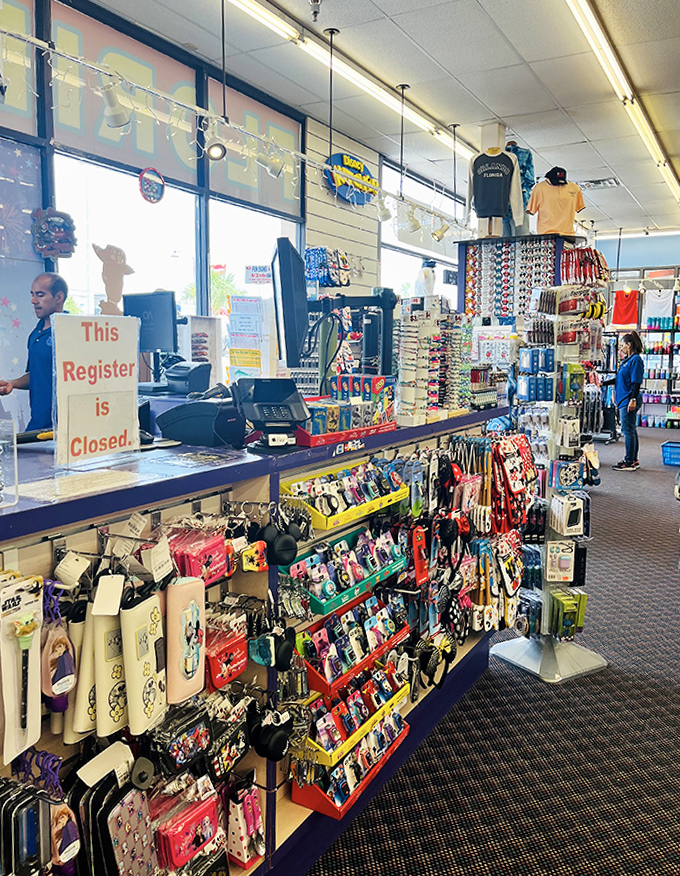 Retail's front lines where credit cards meet their destiny. The checkout counter witnesses daily financial sacrifices to the gods of vacation memorabilia.