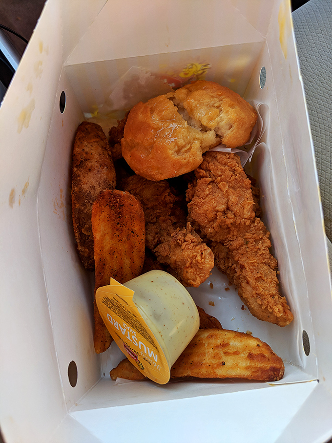 The perfect trifecta: golden tenders, seasoned potato wedges, and a buttery biscuit create the holy trinity of comfort food done absolutely right.
