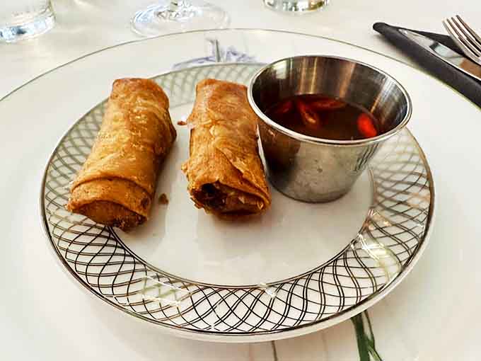 Crispy egg rolls with dipping sauce show the menu's surprising range &ndash; a delicious detour from the expected that rewards adventurous eaters.