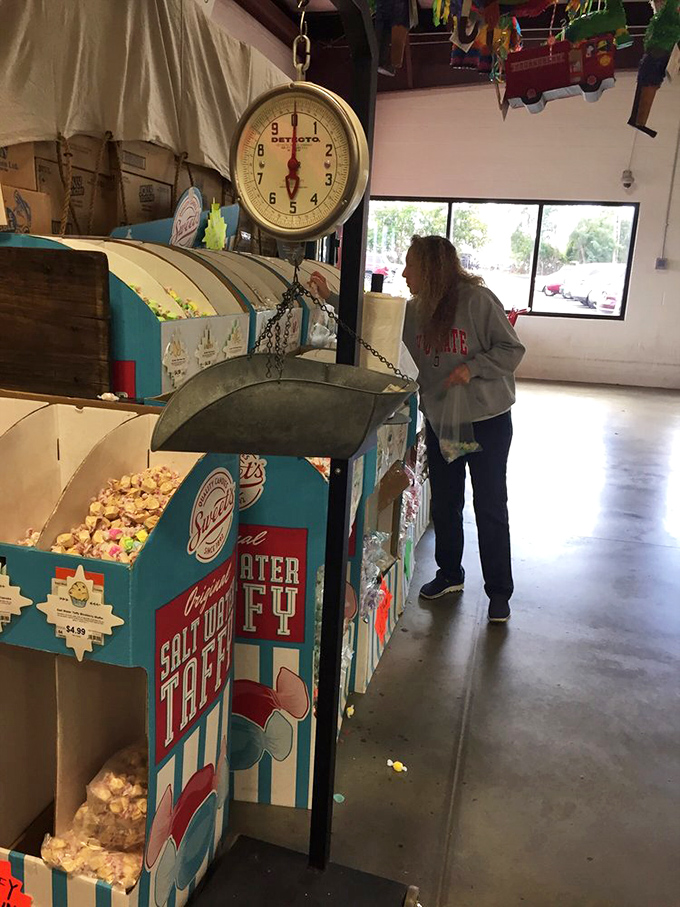 Vintage-style candy bins with old-fashioned scoops, making you feel like you've time-traveled to when penny candy was actually a penny.