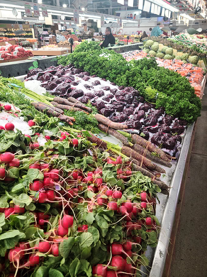 Nature's jewels on display &ndash; radishes gleaming like rubies, purple cabbage resembling amethyst, and carrots stretching toward the sky.