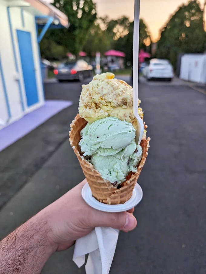 Two perfect scoops nestled in a waffle cone &ndash; the ideal balance of flavors and textures for maximum dessert happiness.