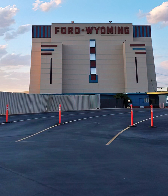 Dusk brings a magical quality to the Ford-Wyoming's distinctive architecture as cars begin to fill the lot.