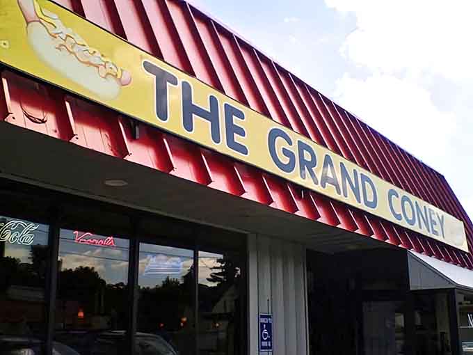 The Grand Coney's classic signage stands proud against the Michigan sky, a beacon of hope for the hungry.
