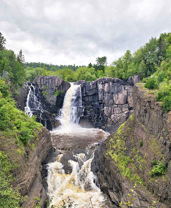 Grand Portage State Park's High Falls plunges 120 feet in a spectacular display, creating the tallest waterfall entirely within Minnesota's borders.