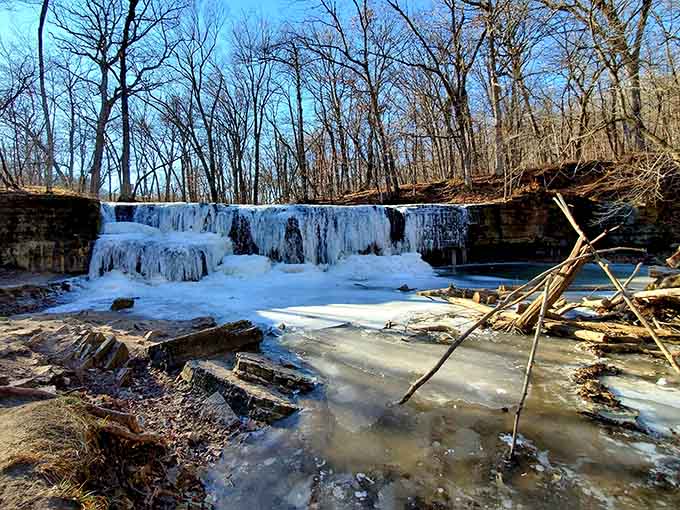 Even in winter's grip, the falls maintain their beauty, proving that some attractions are worth visiting year-round, frostbite risk and all.