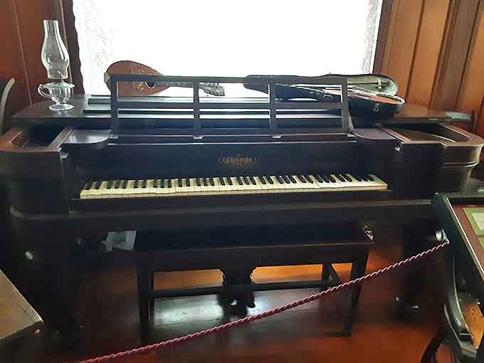 This vintage piano once filled Mac-A-Cheek with melodies, representing an era when families created their own entertainment through music and conversation.