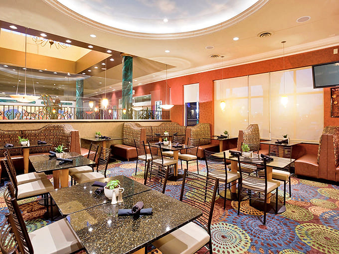 Refuel your waterlogged adventurers in this stylish dining space where nobody minds if your hair's still damp from the slides.