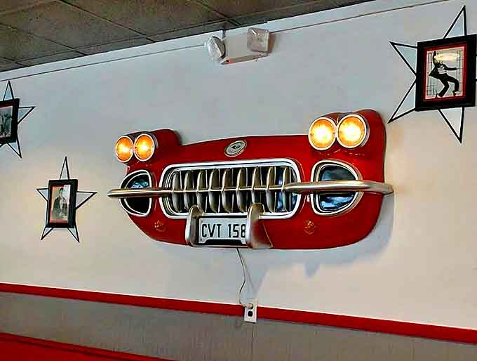 Vintage car parts transformed into wall art remind diners of an era when automobiles had personality and chrome was king.