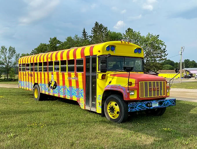 All aboard the happiness express &ndash; K & K's colorful shuttle bus transports tubers to their watery starting point.