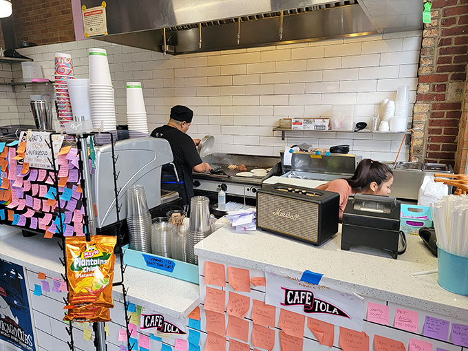 Where the magic happens &ndash; the kitchen area buzzes with activity as empanadas are lovingly crafted from scratch throughout the day.