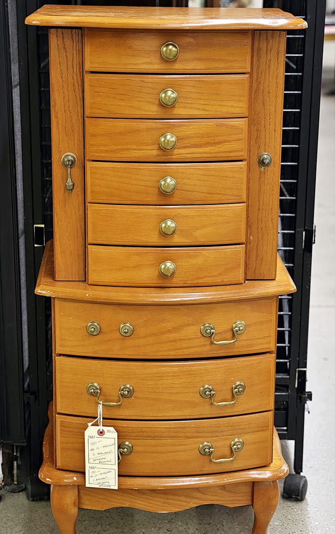 Vintage drawer: Craftsmanship from another era! This honey-colored jewelry chest showcases the solid construction and attention to detail rarely found today.