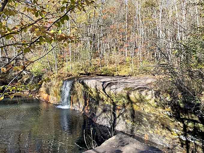 Nature's perfect viewing platform: this rocky ledge offers front-row seats to one of Minnesota's most underappreciated water features.
