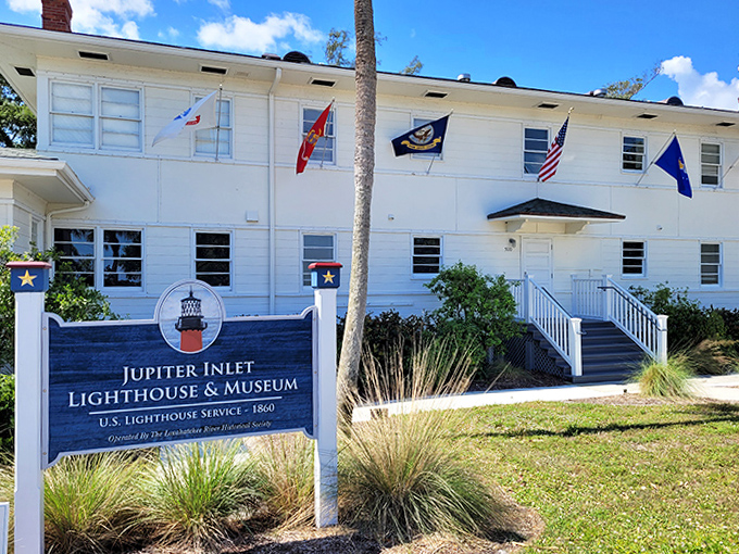 The welcoming gateway to maritime history, where flags snap in the breeze and stories wait to be discovered.
