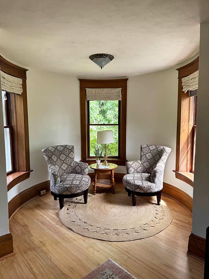 The turret sitting area creates a circular sanctuary of calm – where reading a book feels like starring in your own fairytale.