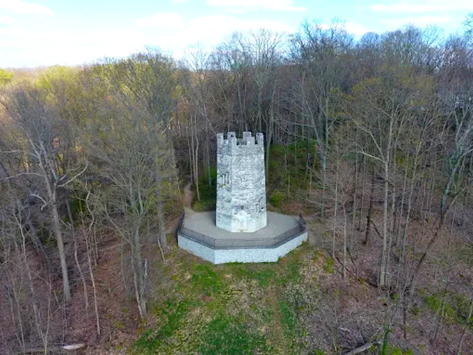 Aerial view showcases the tower's perfect isolation &ndash; a medieval anomaly standing proudly in Cincinnati's modern landscape.