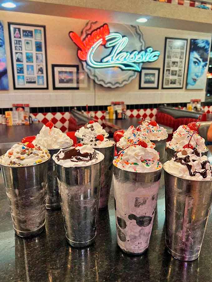 Milkshakes lined up like soldiers of sweetness, each one thick enough to stand a spoon in without assistance.
