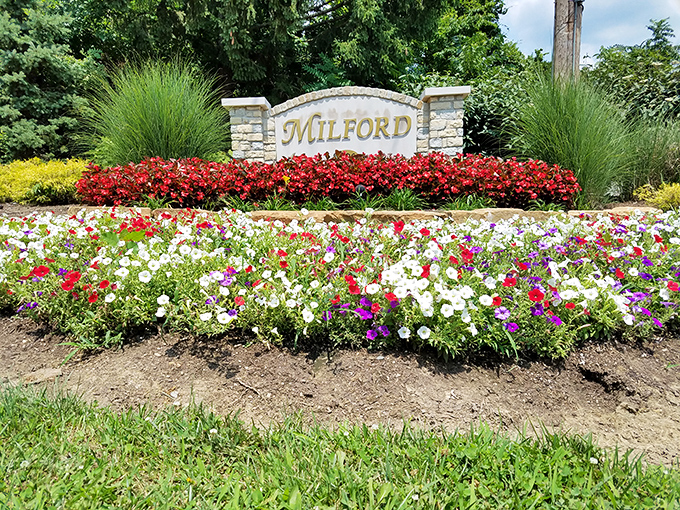 Milford's welcome sign, surrounded by seasonal blooms, offers the first hint that this town takes pride in both its history and its appearance.