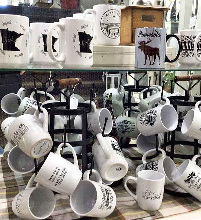 Minnesota pride overflows in this mug collection—each ceramic vessel ready to warm hands and spark conversations about northern adventures.