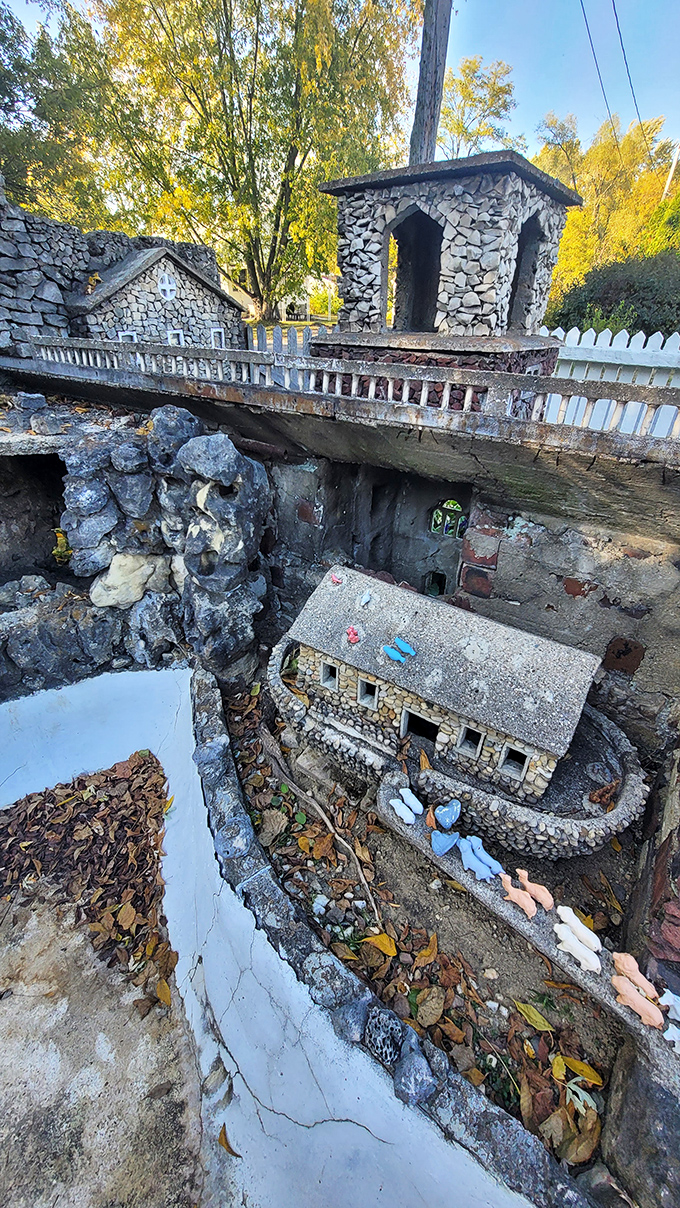 A miniature Noah's Ark nestles in a stone ravine, complete with tiny details that reveal themselves only upon close inspection.