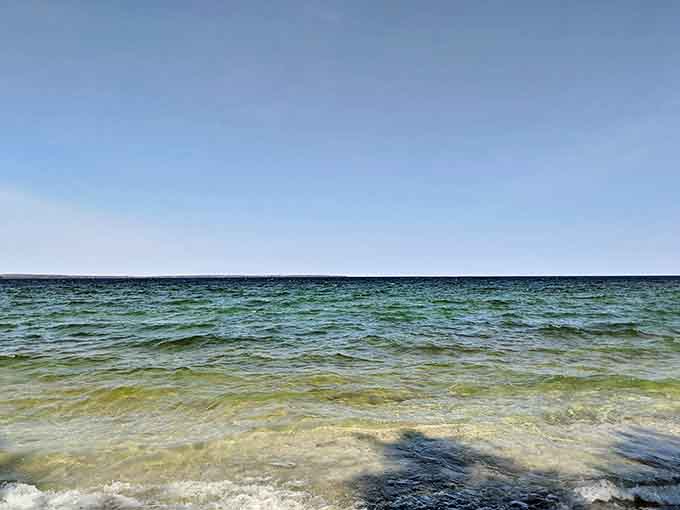 The hypnotic rhythm of Green Bay's gentle waves provides the soundtrack to Door County's most peaceful shoreline meditation.