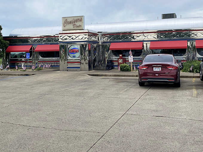 The parking lot has welcomed chrome-finned Cadillacs and modern SUVs alike, all carrying hungry souls seeking comfort food.