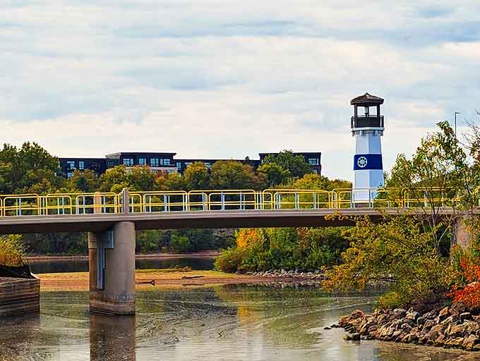 Plymouth Avenue Bridge frames the lighthouse perfectly, creating a composition that local photographers never tire of capturing.