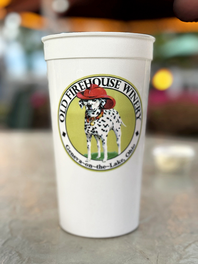 The souvenir cup featuring their famous Dalmatian logo &ndash; a practical memento that brings lake memories home one sip at a time.