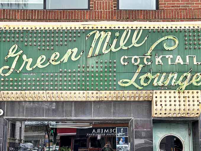 By day, the vintage signage reveals its weathered charm, a testament to decades of Chicago winters and musical summers.
