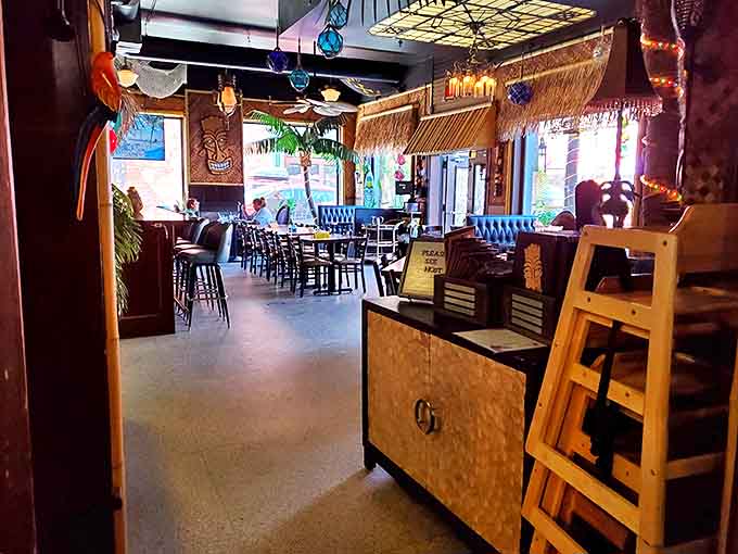 Plush blue seating creates intimate conversation nooks where winter-weary Minnesotans can pretend they're in Maui instead of the Midwest.