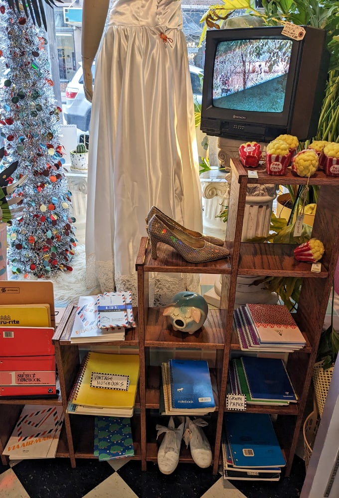 Wedding dress meets vintage TV in this corner display&mdash;perhaps for the bride who wants "Something old, something viewed, something borrowed, something blue."