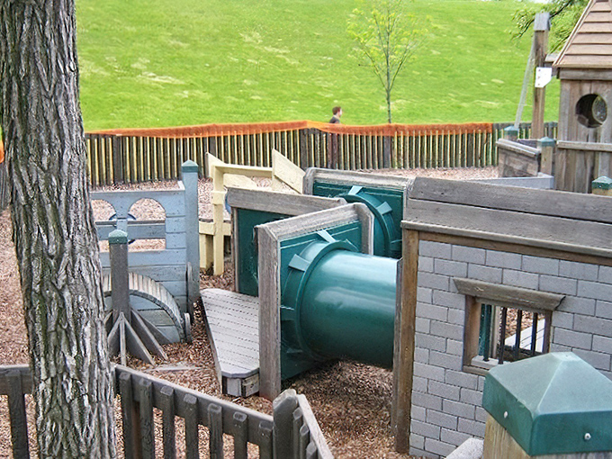 Tunnel slides offer thrilling descents from the castle-like towers, delighting generations of Minnesota children.