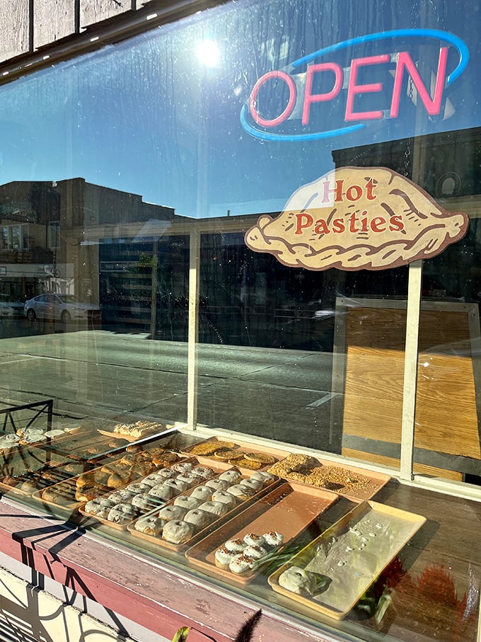 Hot pastries sign, cold resistance impossible, these window displays have been breaking diets and making memories for decades.
