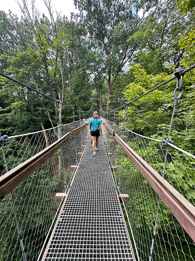 14. visitor on the elevated boardwalk