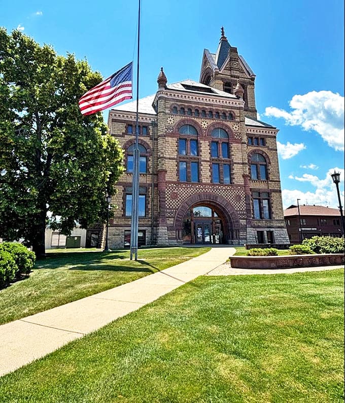 The Winona County Courthouse stands proud with its distinctive tower and Romanesque details, a testament to small-town grandeur.