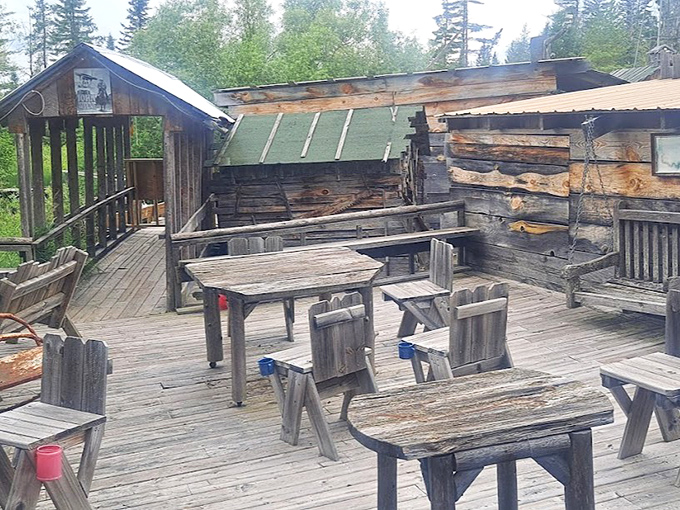 This wooden deck seating area practically begs for a gathering of friends sharing stories as the sun sets over the pines.
