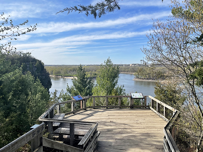 This wooden platform serves as nature's balcony, offering front-row seats to a landscape millions of years in the making.