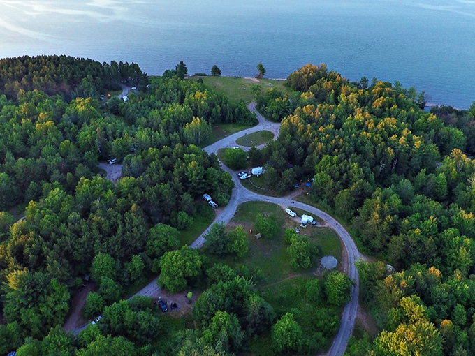 Bird's eye brilliance: Bay Furnace Campground from above reveals nature's perfect design &ndash; each site a private wilderness retreat.